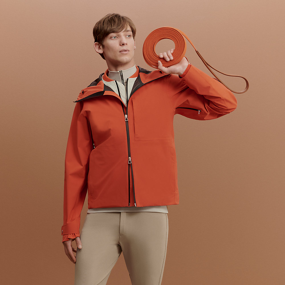 Hardshell Jumping water-resistant jacket - Orange | Hermès Belgium